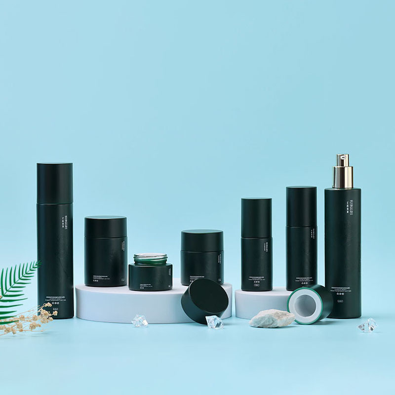 Flush shoulder flint glass bottle and cream jar - Karriv Packaging